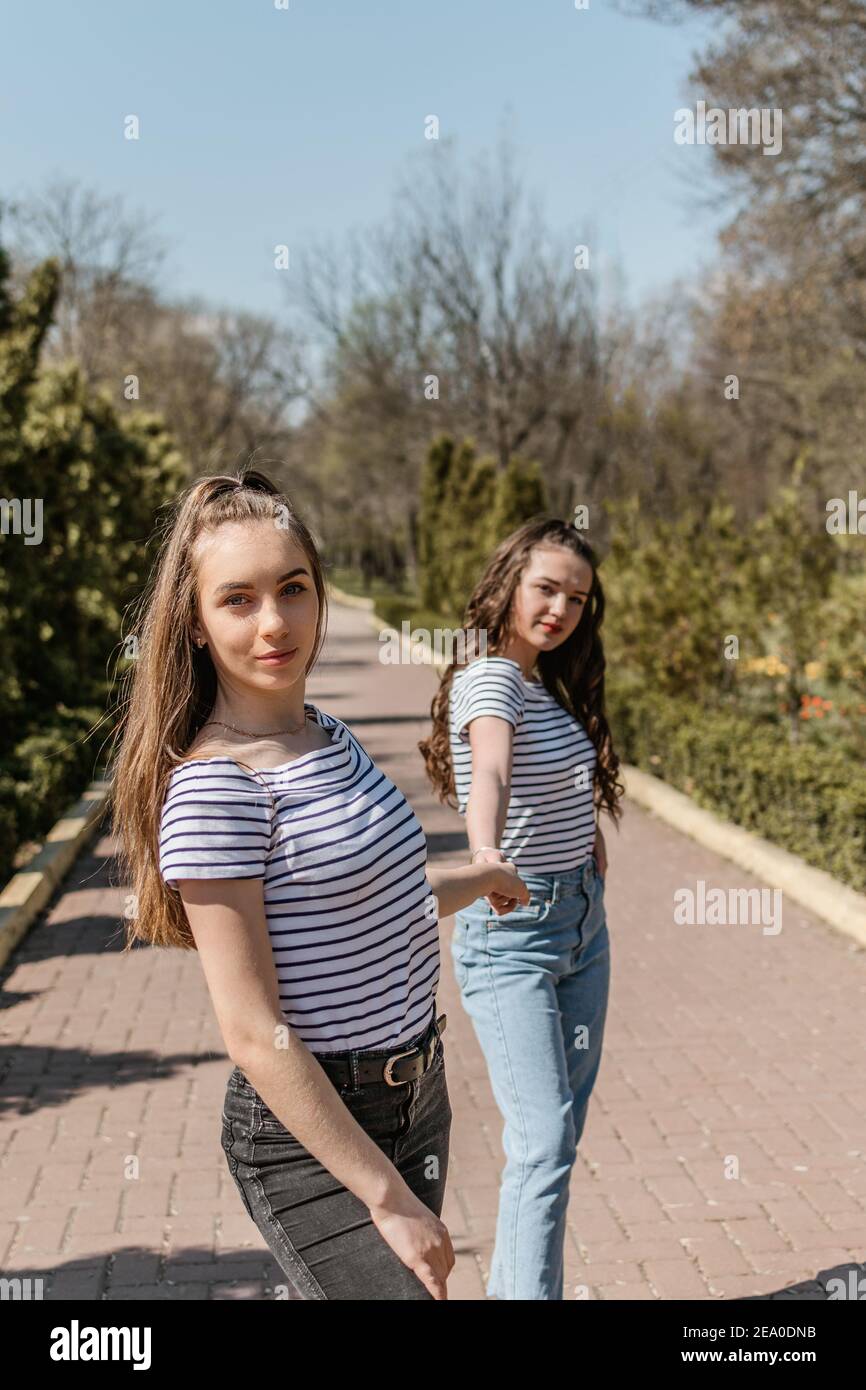 Gen z girls enjoying outdoors, expressing positive emotions. Outdoor ...