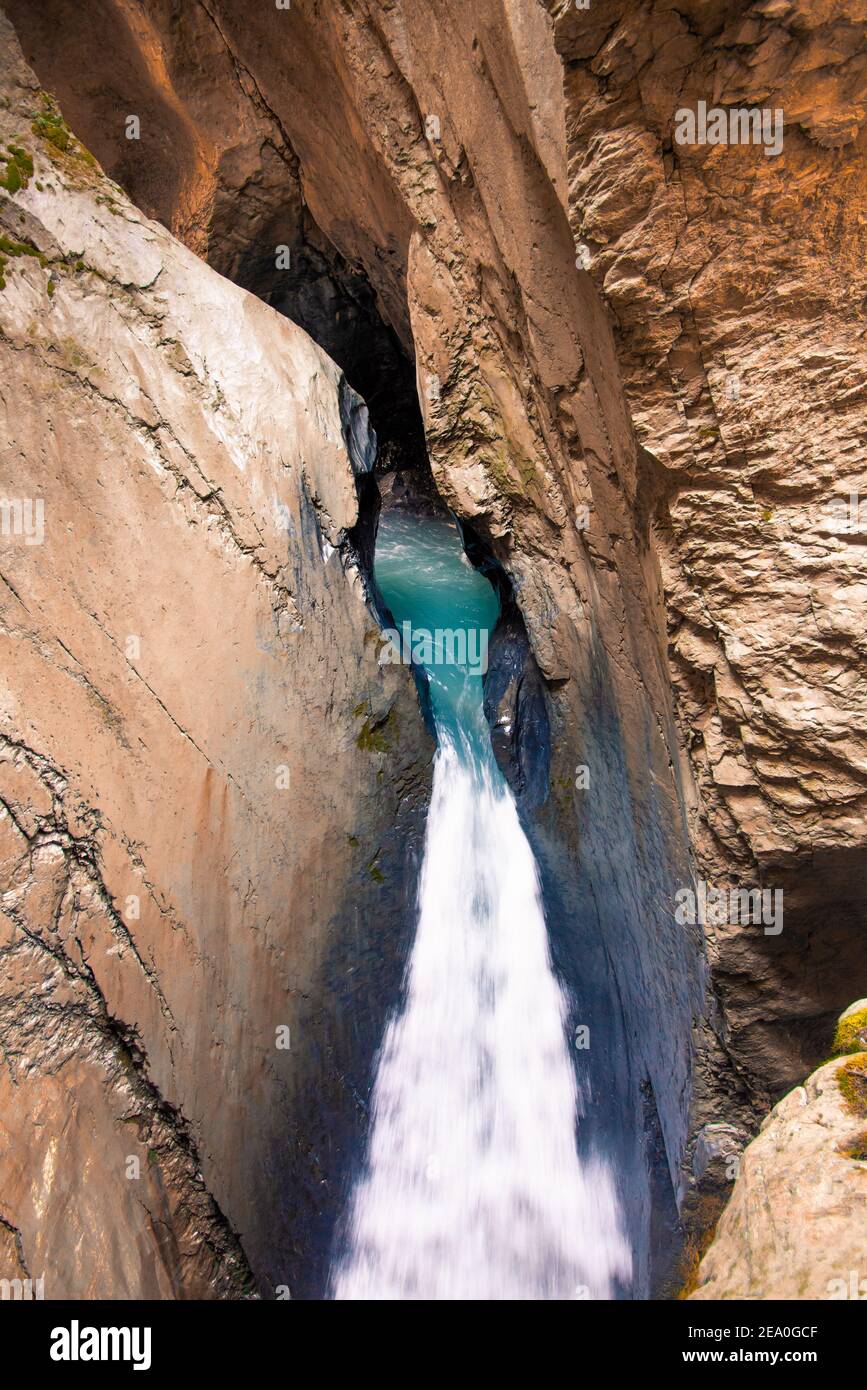 Flowing water of a waterfall inside a mountain Stock Photo - Alamy