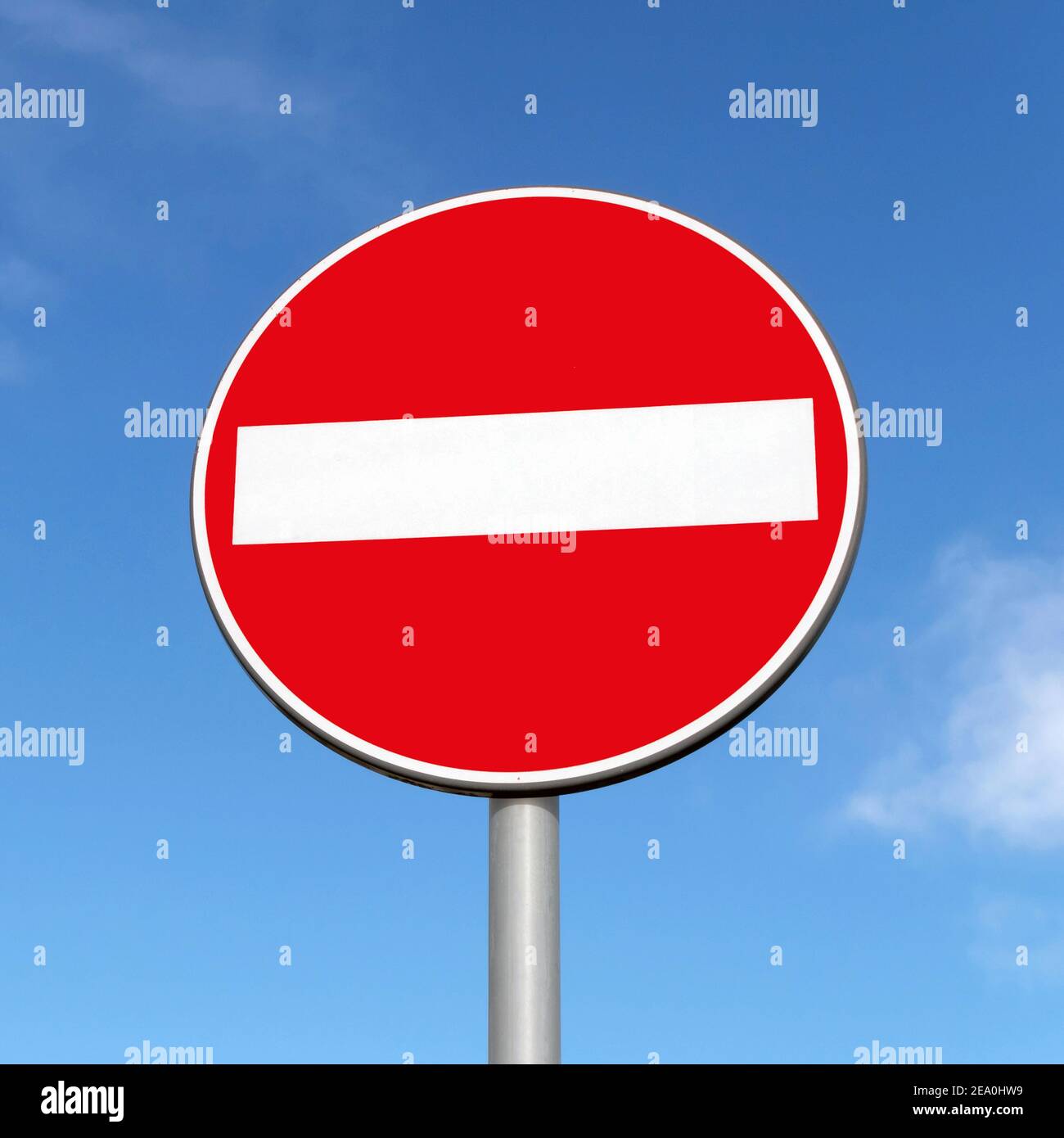 No entry road sign on a blue sky background Stock Photo - Alamy