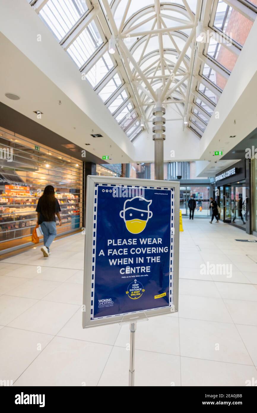 Sign with instructions to wear a face covering in Wolsey Walk shopping ...
