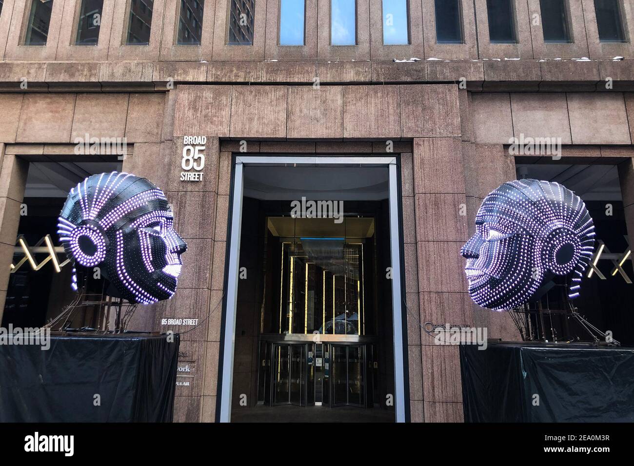 Talking Heads, a light installation by artist Viktor Vicsek, is installed outside of 85 Broad ...