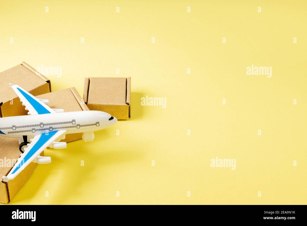 Airplane and stack of cardboard boxes. concept of air cargo and parcels ...