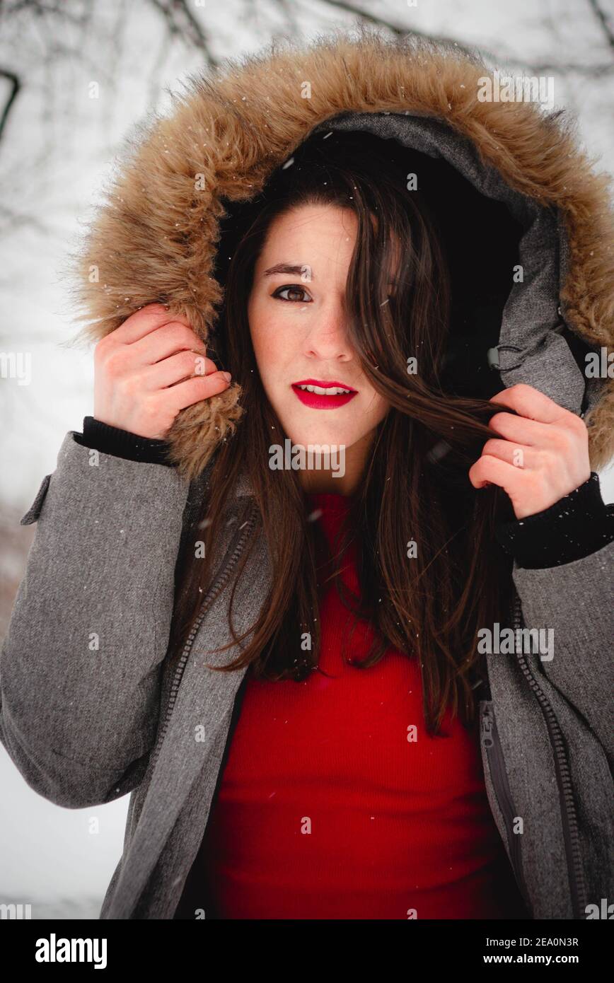 Woman posing in the snow hi-res stock photography and images - Alamy