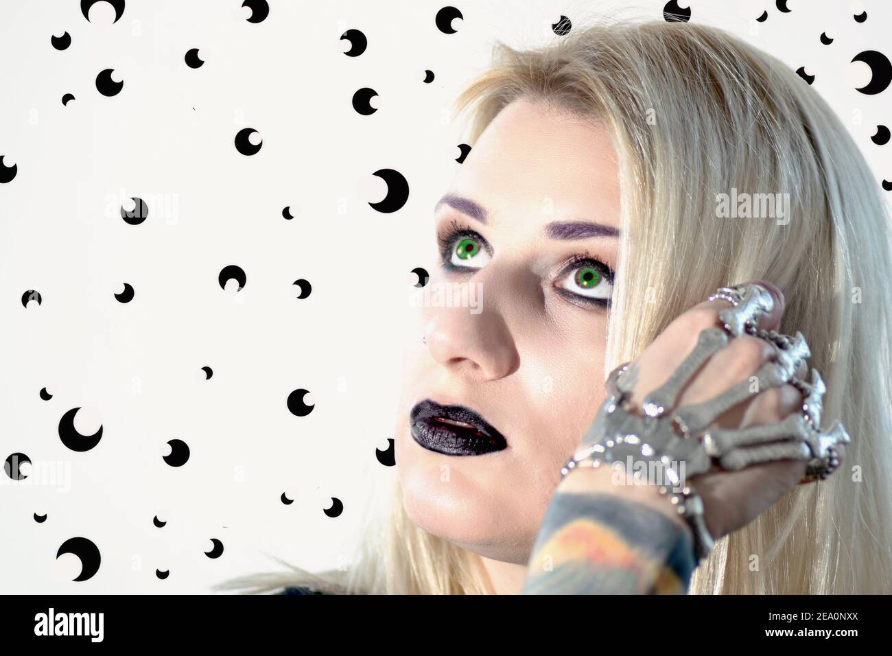 Punk, alternative style woman beauty portrait with moon background ...