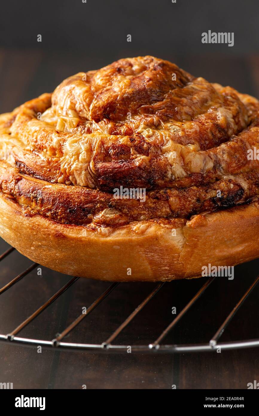 Large savoury scroll with melted cheese and Vegemite Stock Photo - Alamy