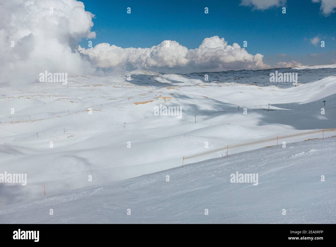Clouds roll over the rolling hills and slopes of Mzaar Kfardebian Ski ...