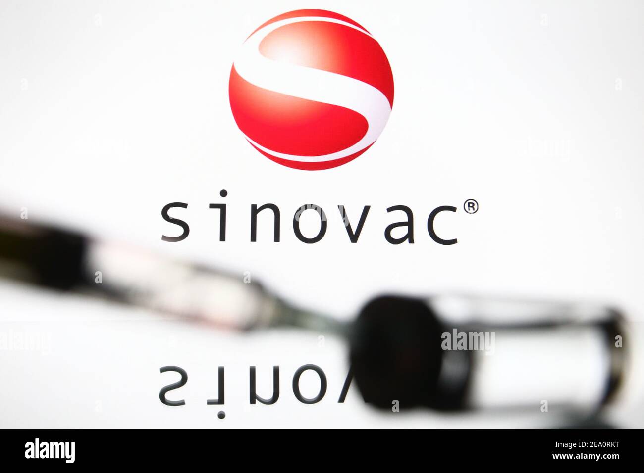 In this photo illustration a Sinovac Biotech Chinese biopharmaceutical ...