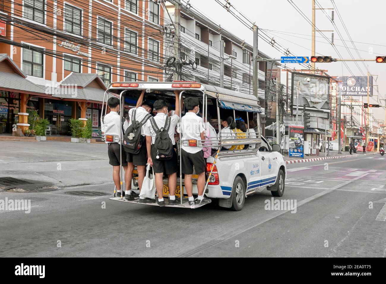 School bus. School children riding home in an overcrowded Songthaew ...