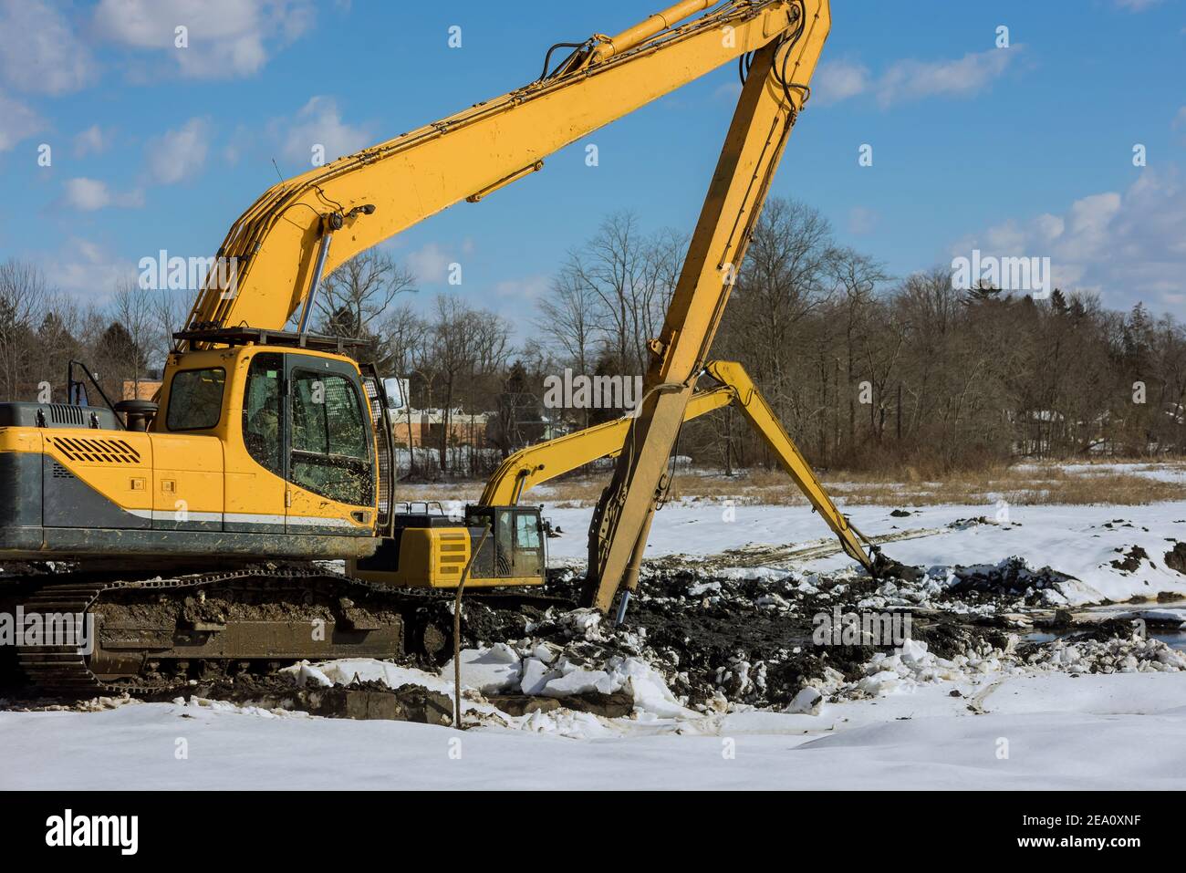 Backhoe dig of during earthworks the digging pit for at construction ...
