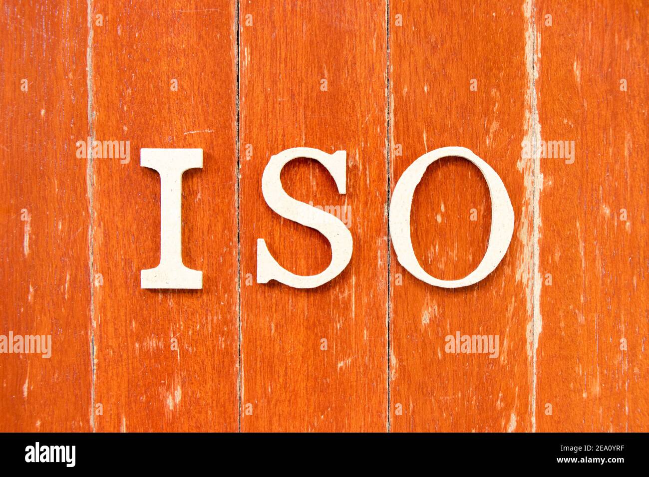 Alphabet Letter In Word Iso On Old Red Color Wood Plate Background alphabet-letter-in-word-iso-on-old-red-color-wood-plate-background