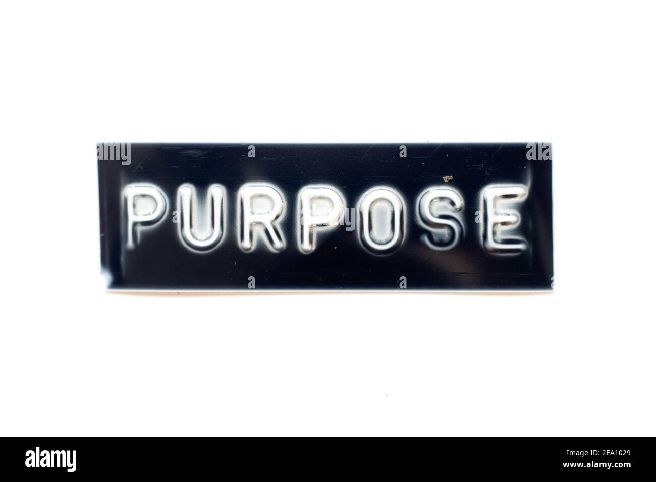 Embossed letter in word purpose on black banner with white background ...