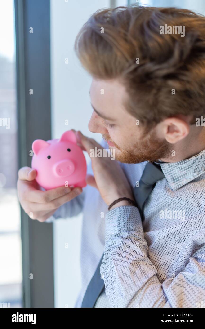 Employees celebrating business success with paper money Stock Photo - Alamy