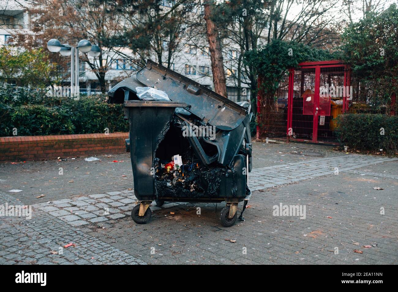 melted trash bin Stock Photo - Alamy