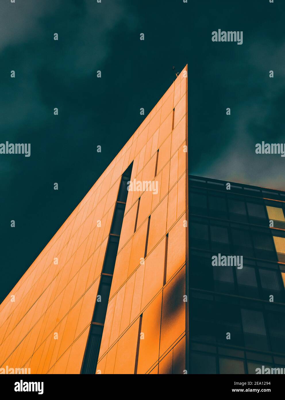 orange sunlight brightens modern architecture Stock Photo - Alamy