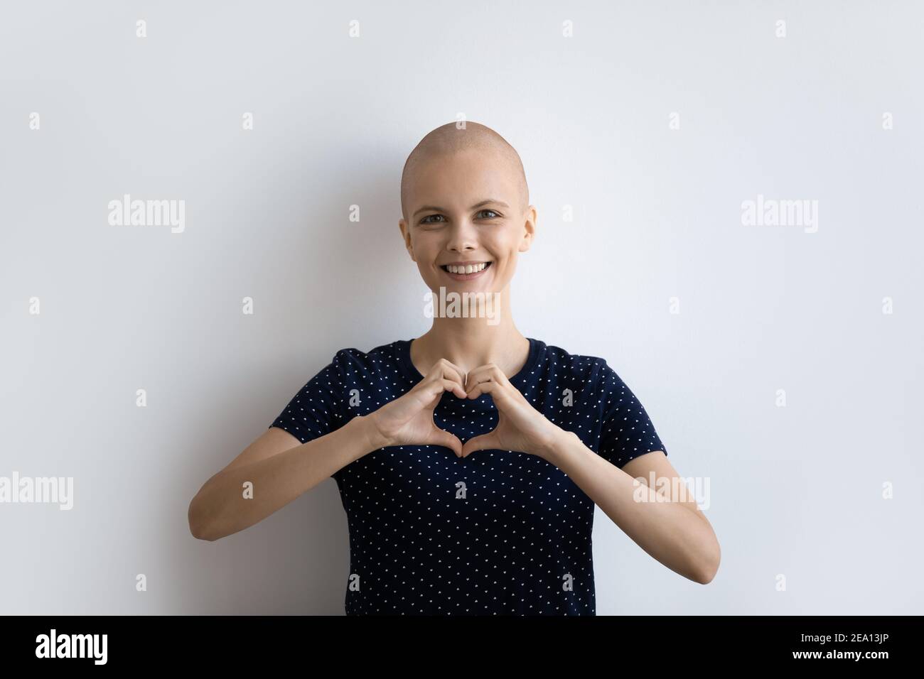 Portrait of happy cancer patient show love hand gesture Stock Photo - Alamy