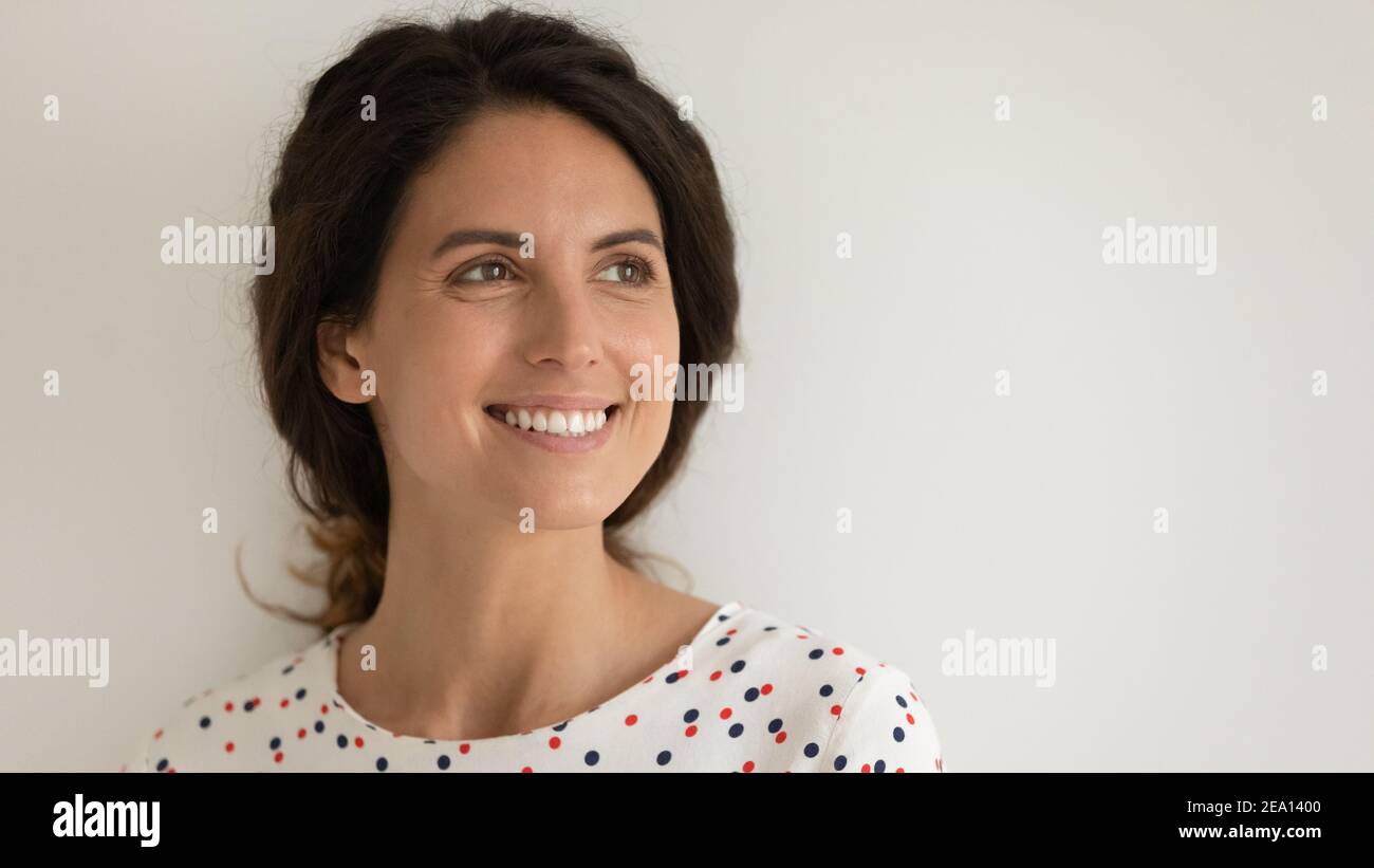Smiling woman look in distance dreaming visualizing Stock Photo - Alamy