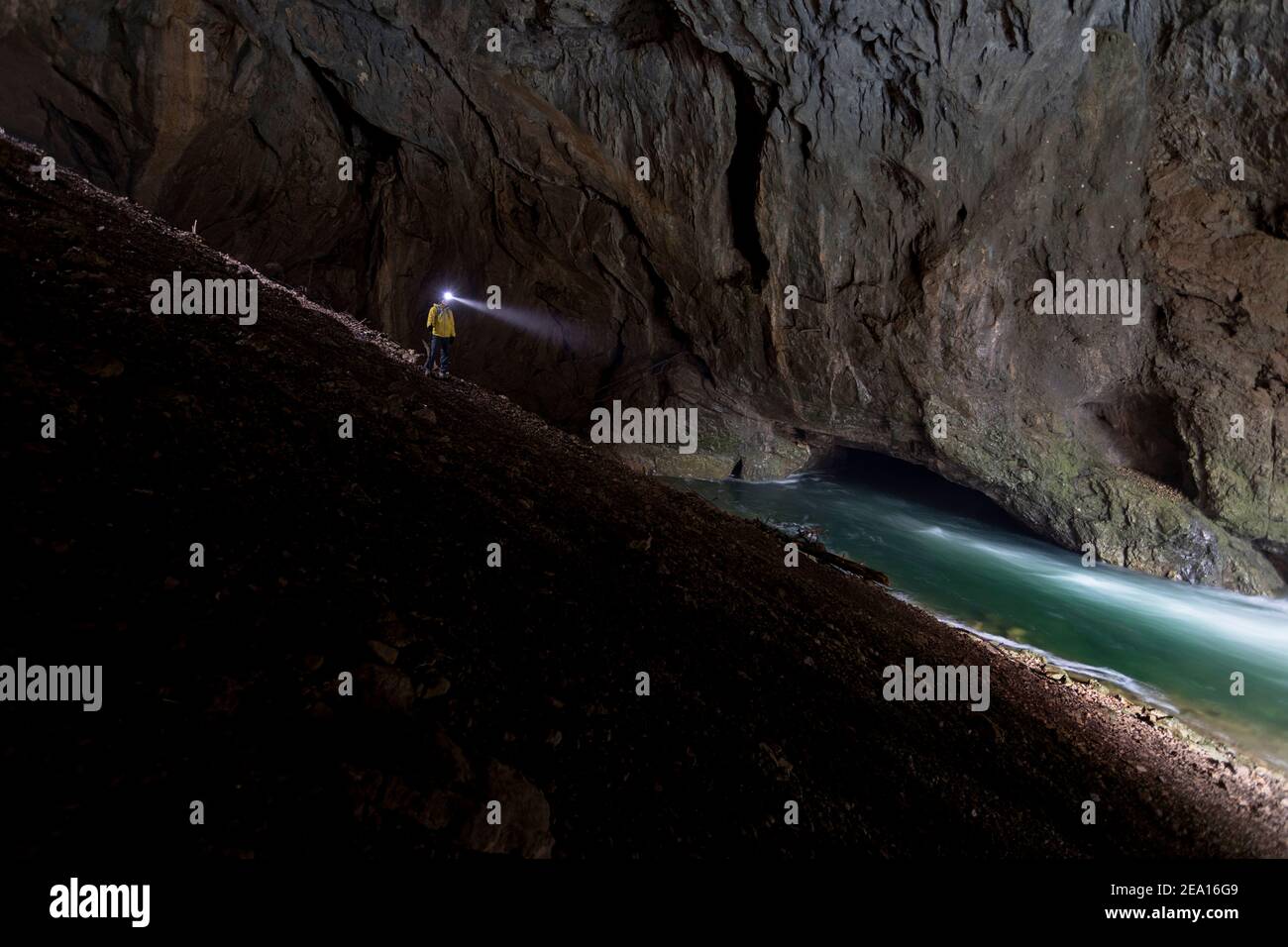 steep terrain rock by the river in Tkalca cave in Rakov Skocjan park ...