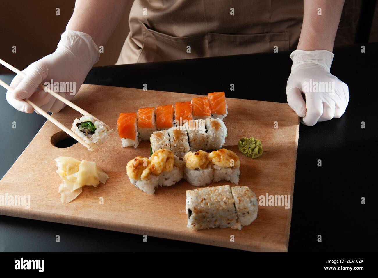 Asian man eating sushi hi-res stock photography and images - Alamy
