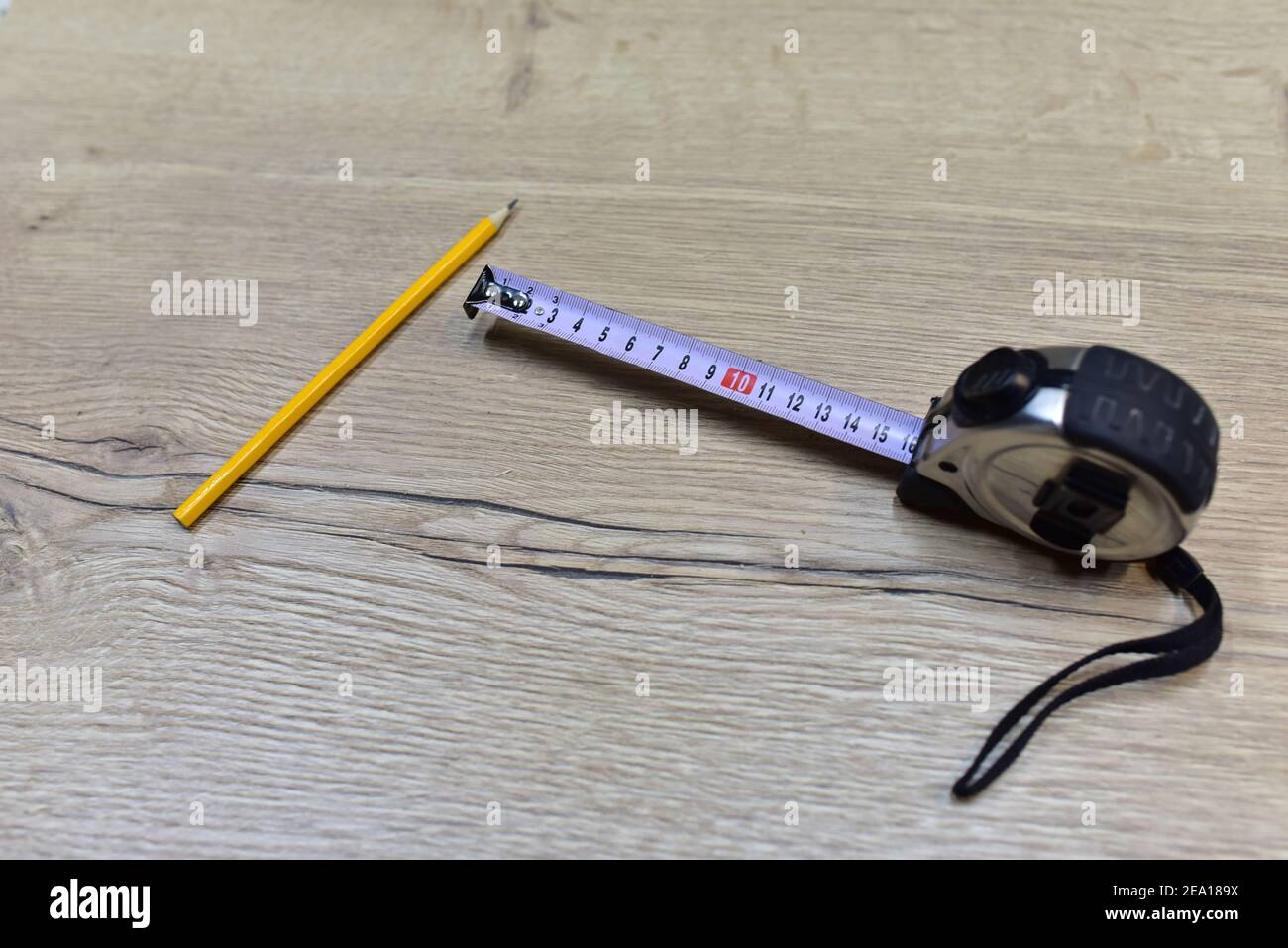 Construction Measuring Tape and pencil for working with wood products ...