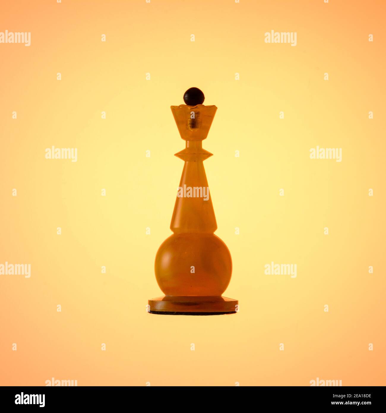 Amber chess set, chess piece White Queen on gold gradient background ...