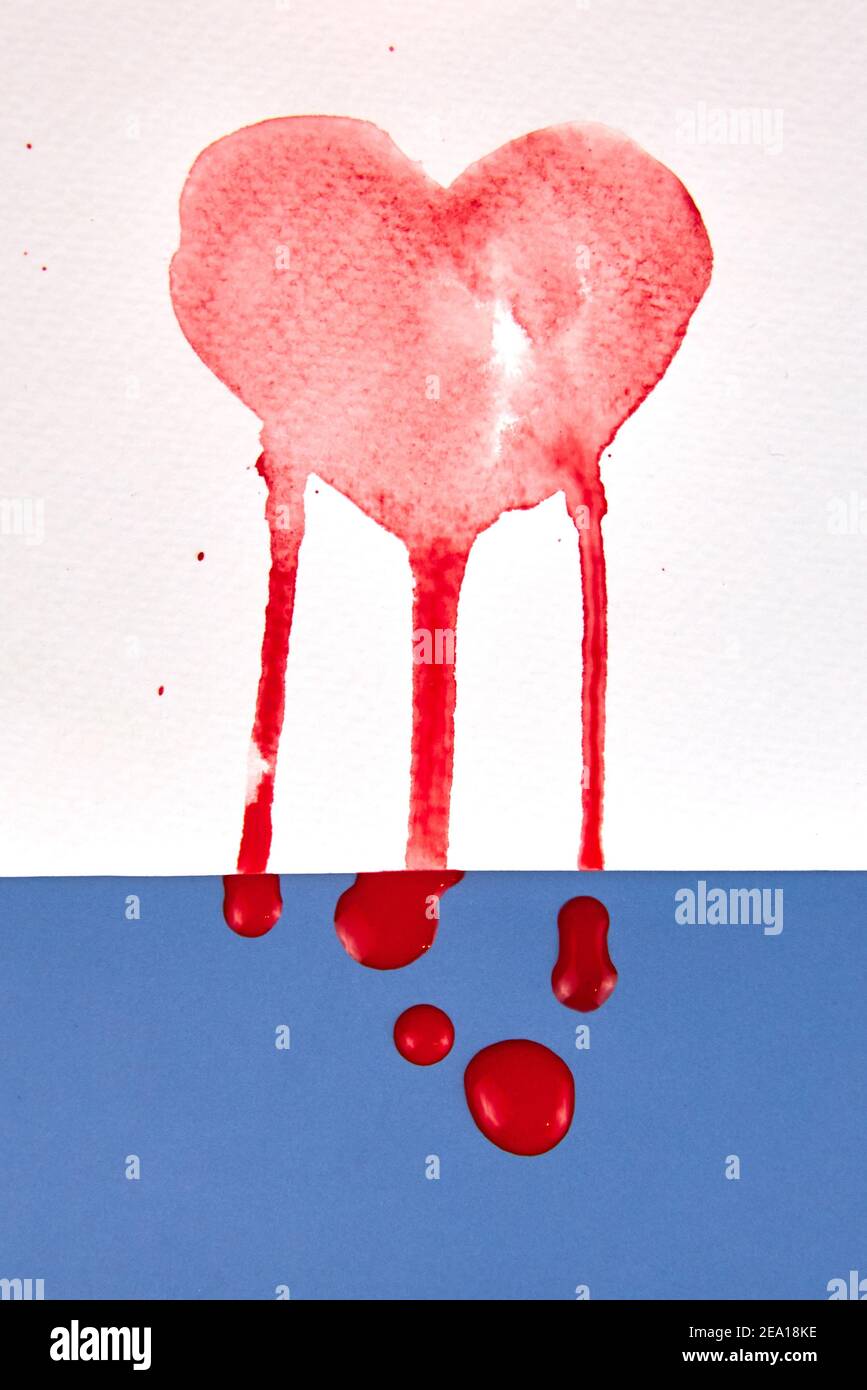 Drawing of a red heart shape with dripping paint in watercolor on white ...