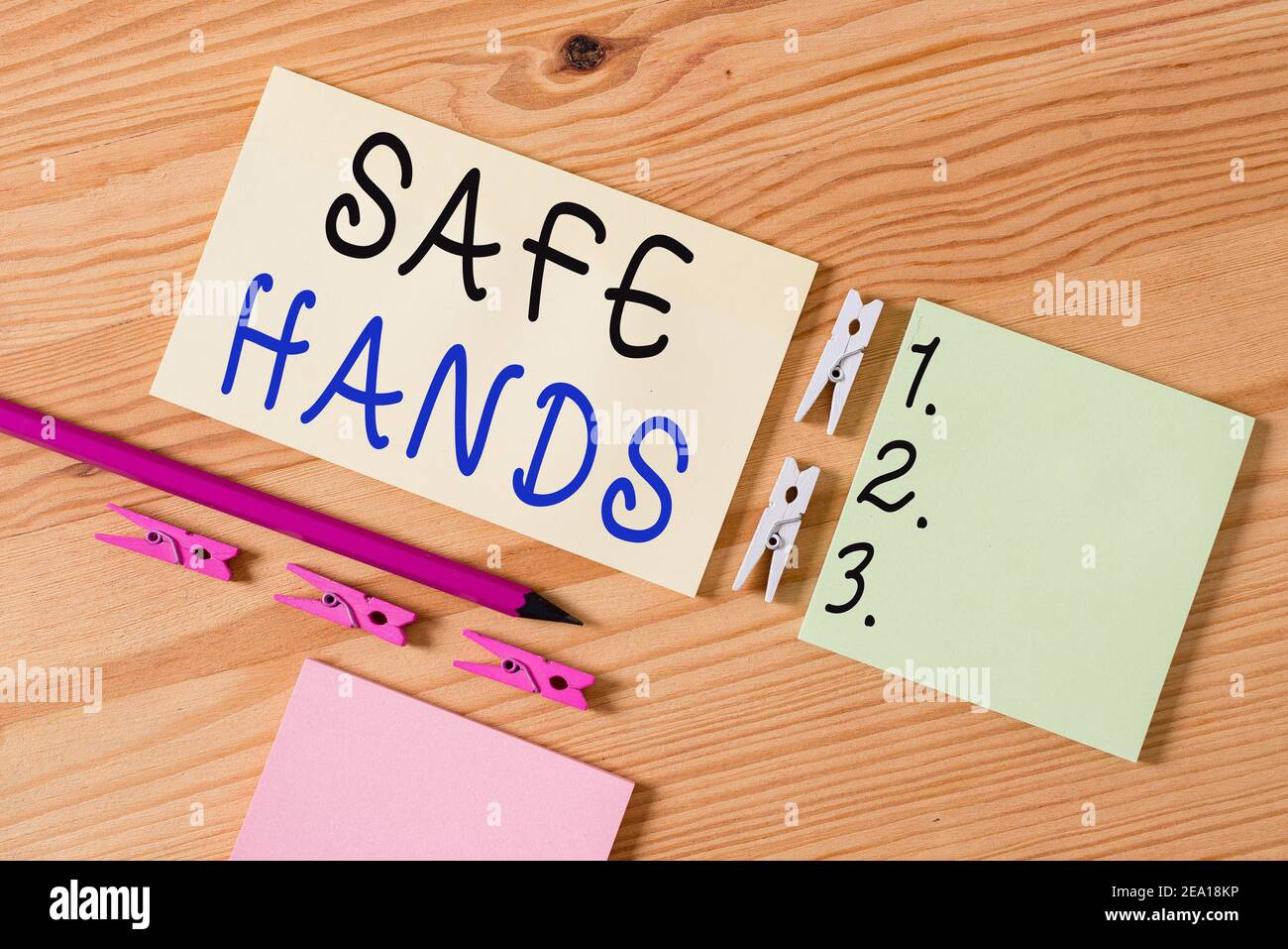 Writing note showing Safe Hands. Business concept for Ensuring the ...