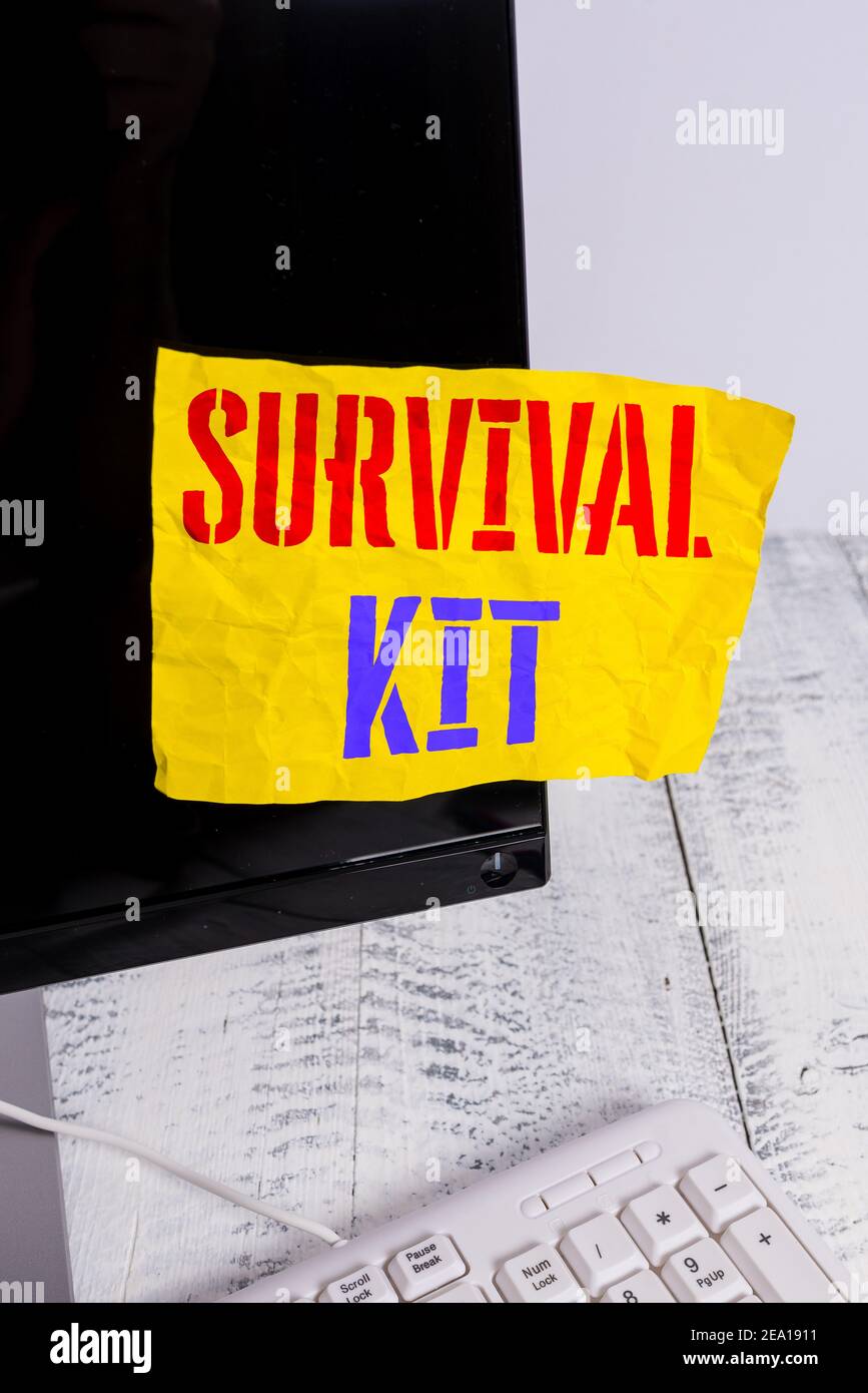 Writing note showing Survival Kit. Business concept for Emergency ...