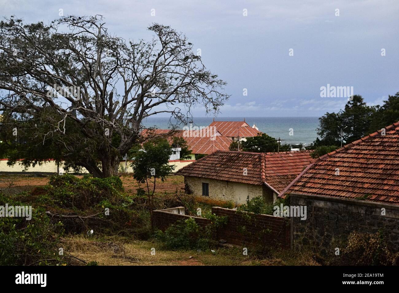 Colonial british houses with shingles orange roof tiles, Kanyakumari ...