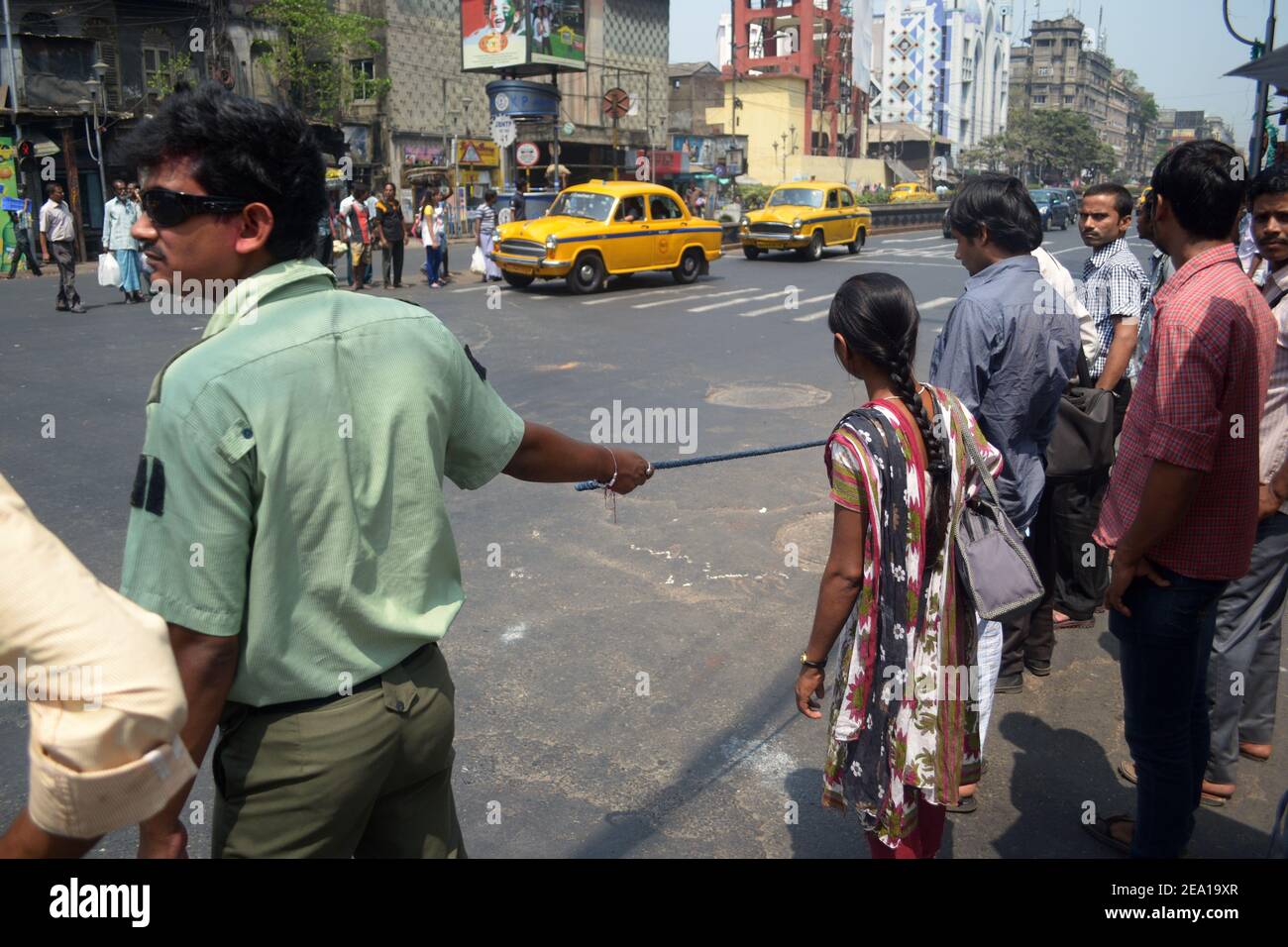 Indian woman crossing road hi-res stock photography and images - Alamy