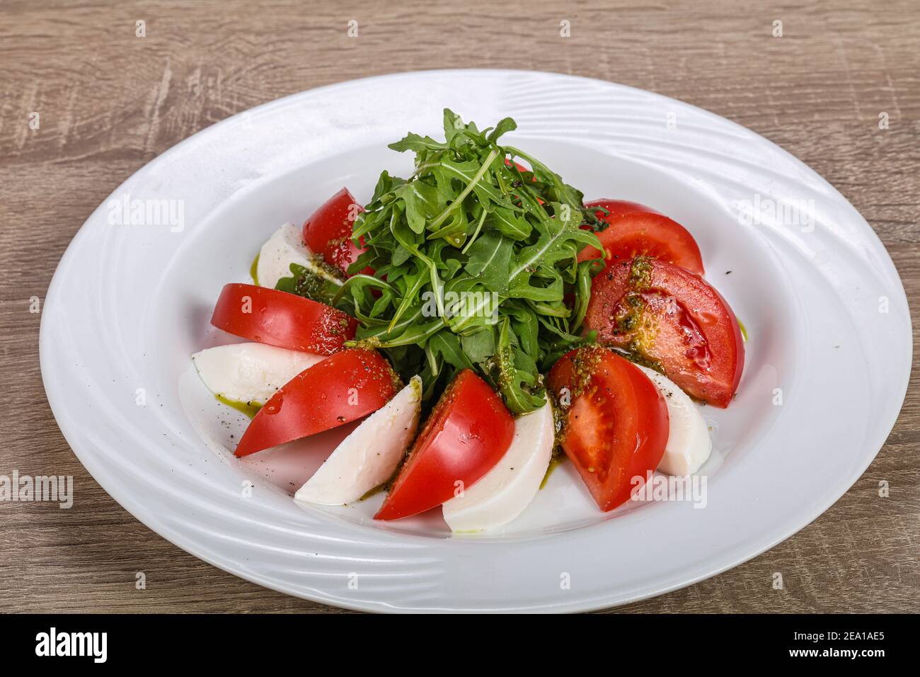 Traditional Italian Caprese salad with mozarela and tomato Stock Photo ...
