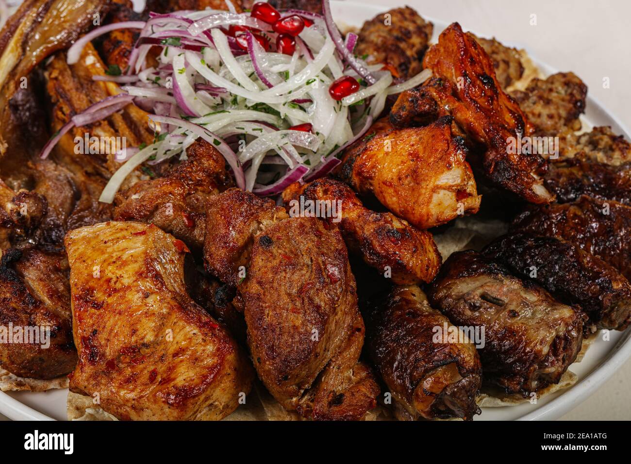Caucasian shashlik plate with grilled meat - beef, lamb. chicken and ...