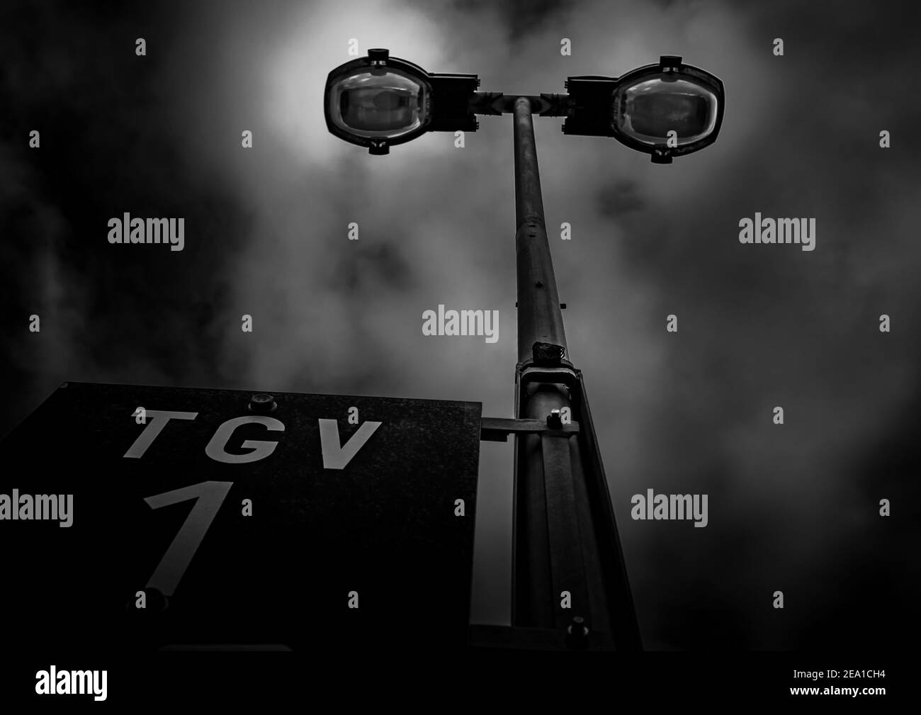 Black and white photo of a train station lamp post Stock Photo - Alamy
