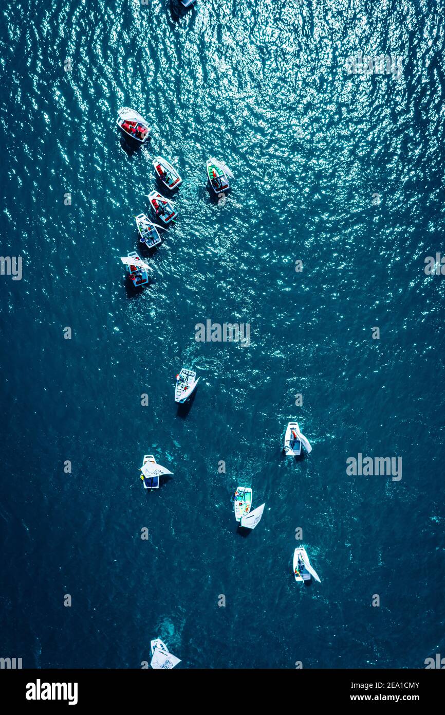 Top down view of boats regatta on blue lake, aerial view of Poland ...