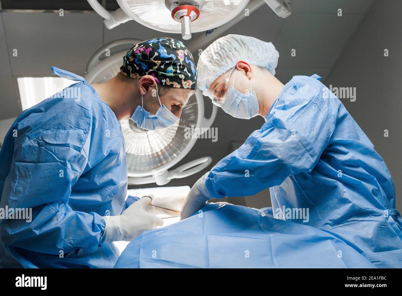 Surgeons do plastic operation in medical clinic. Surgery. Professional ...