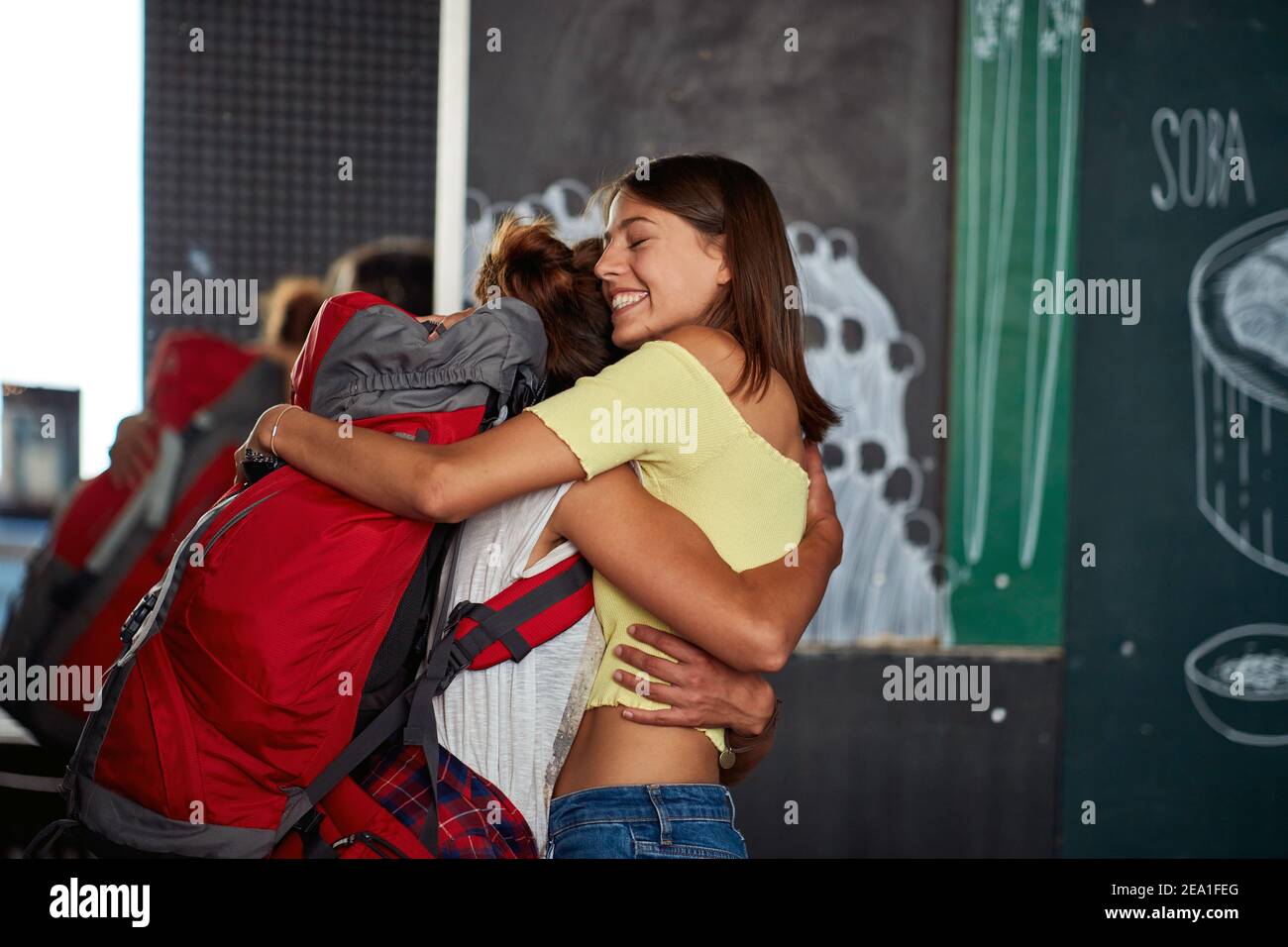 Two sisters hugging hi-res stock photography and images - Alamy