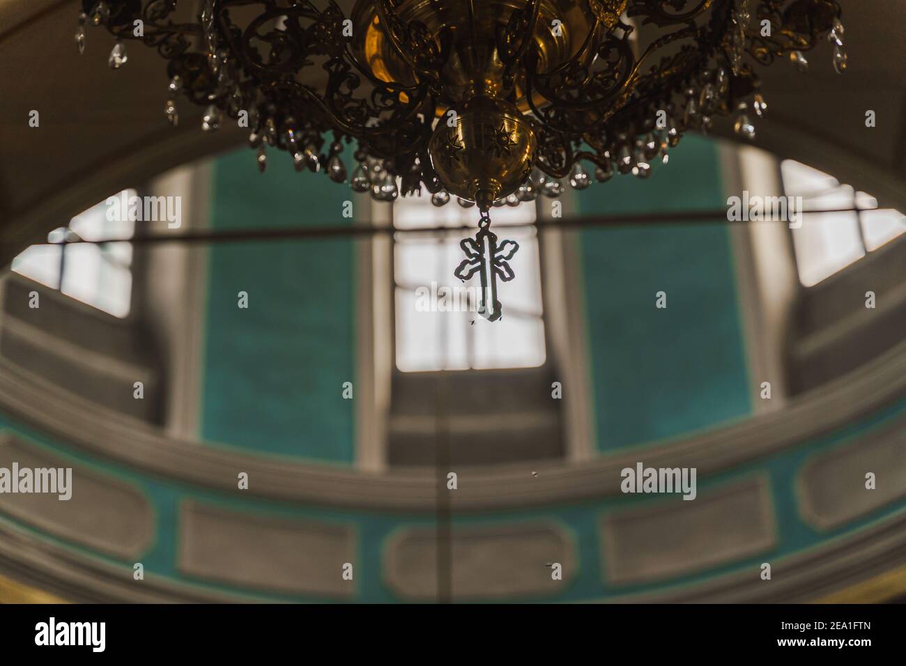 A little Orthodox cross in the church interior. Orthodox tradition and ...