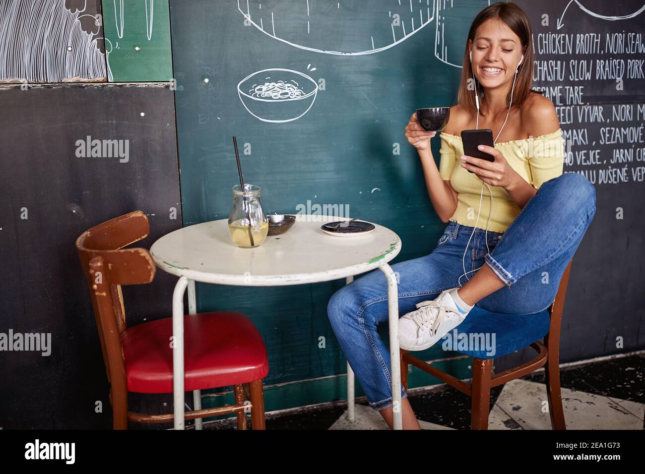 Cafe alone mobile attractive hi-res stock photography and images - Alamy