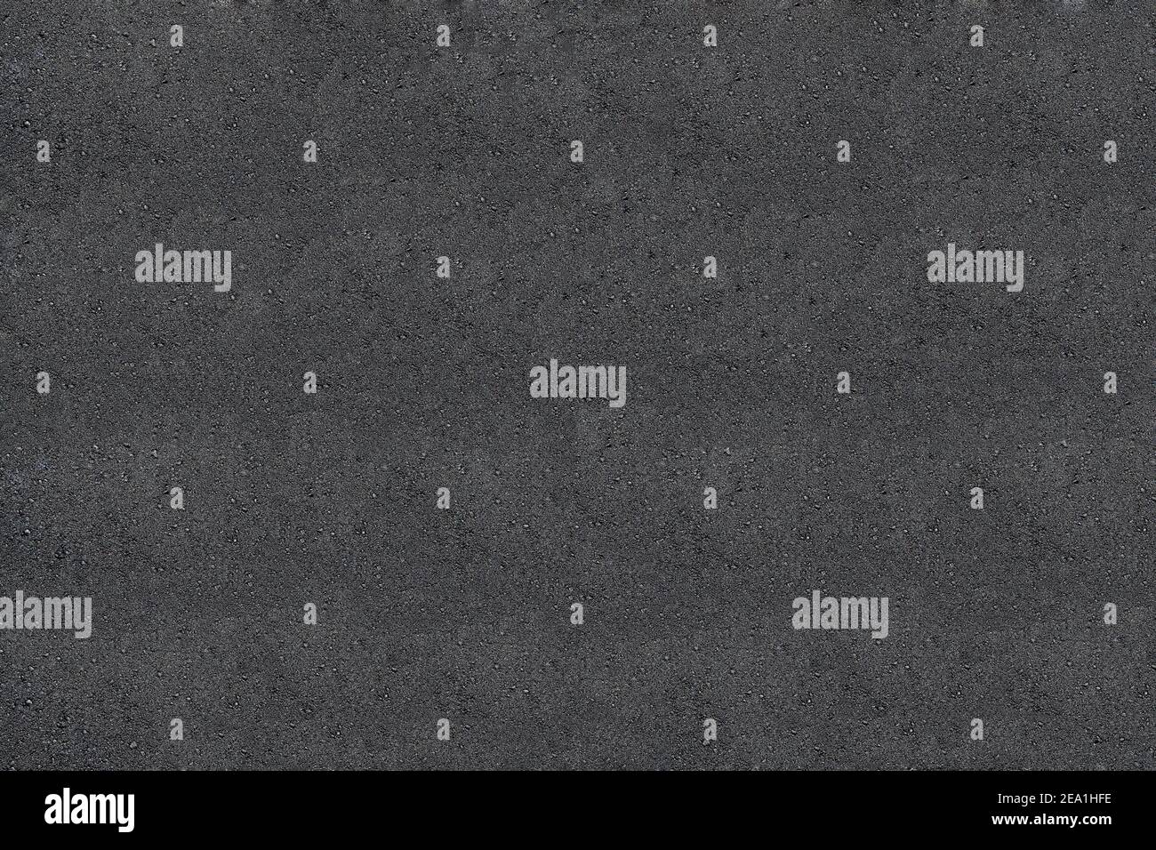 Asphalt texture - top view and close-up of a fragment of an old asphalt ...