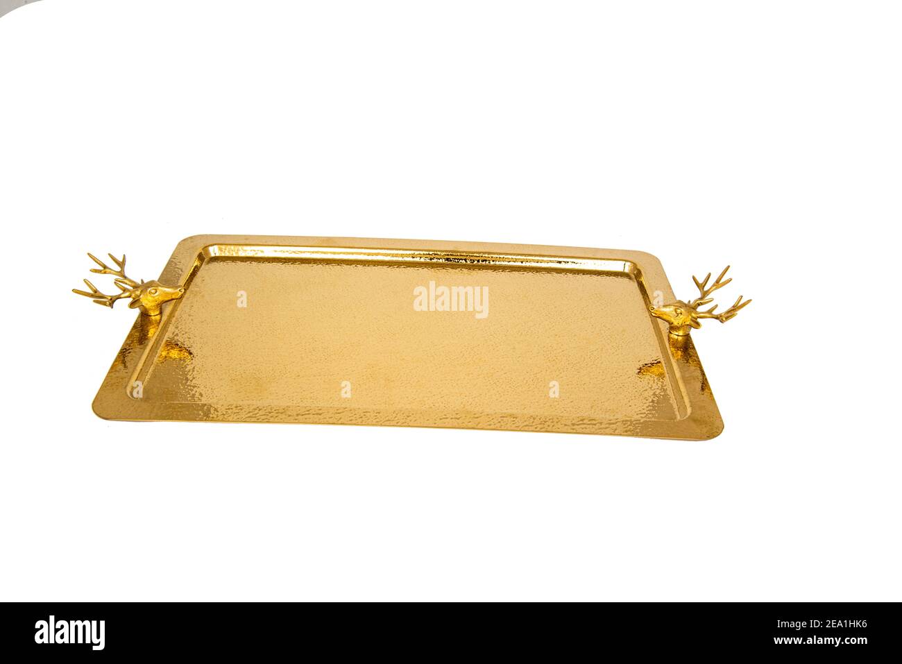 gold plated metal object isolated on white Stock Photo - Alamy