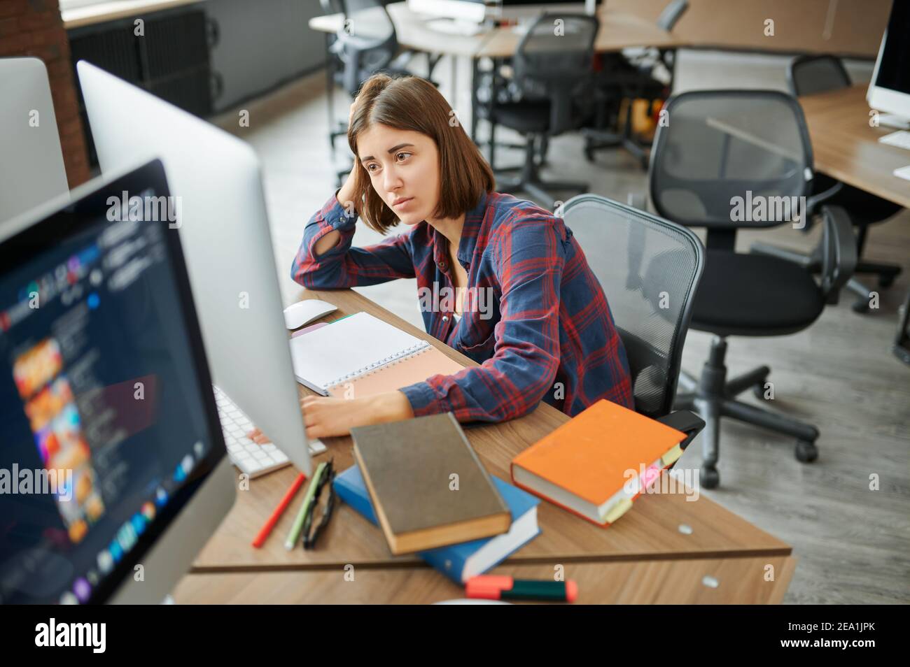 Female employee works on computer hi-res stock photography and images ...