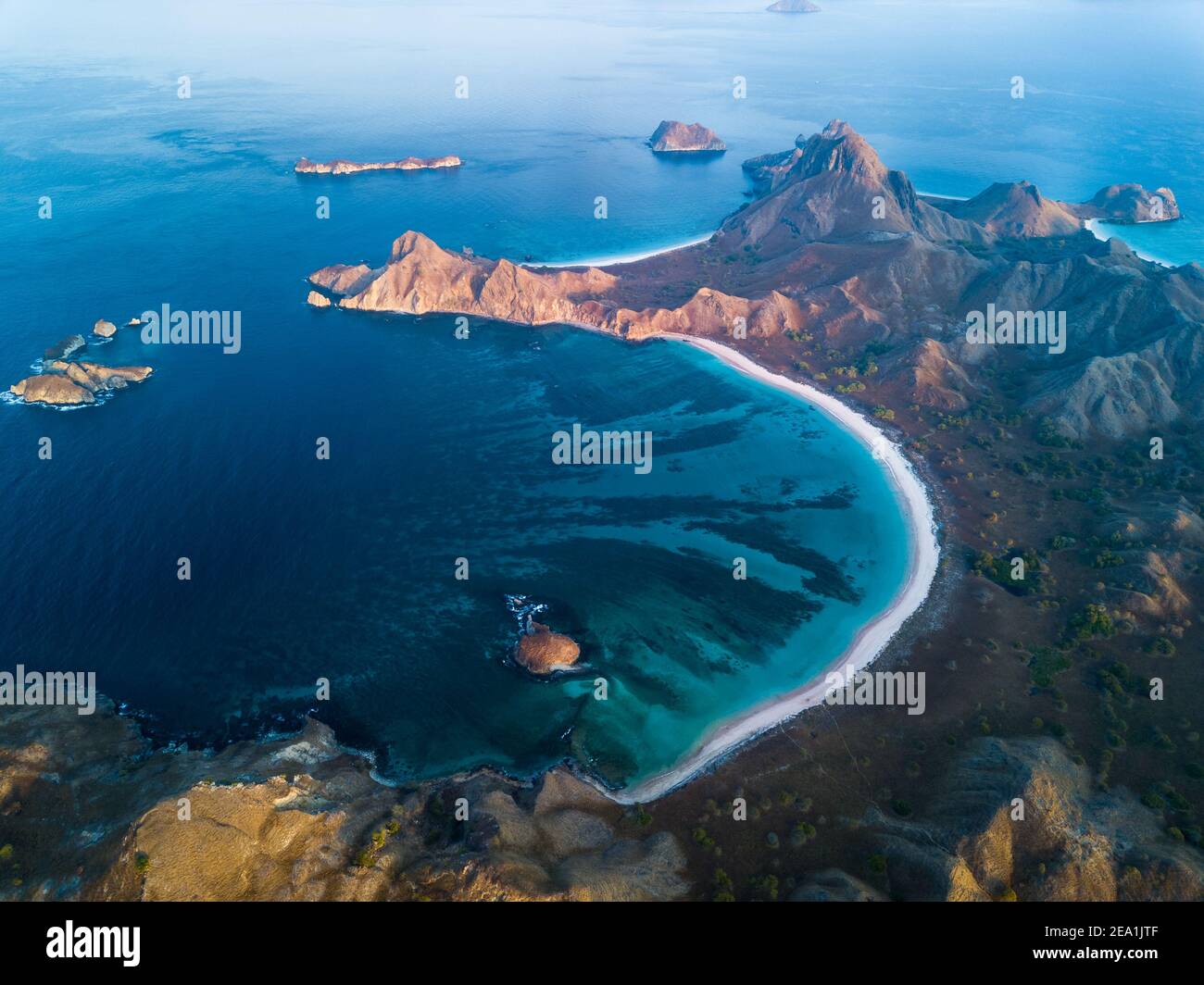 Blue water of pink beach of komodo islands national park hi-res stock ...