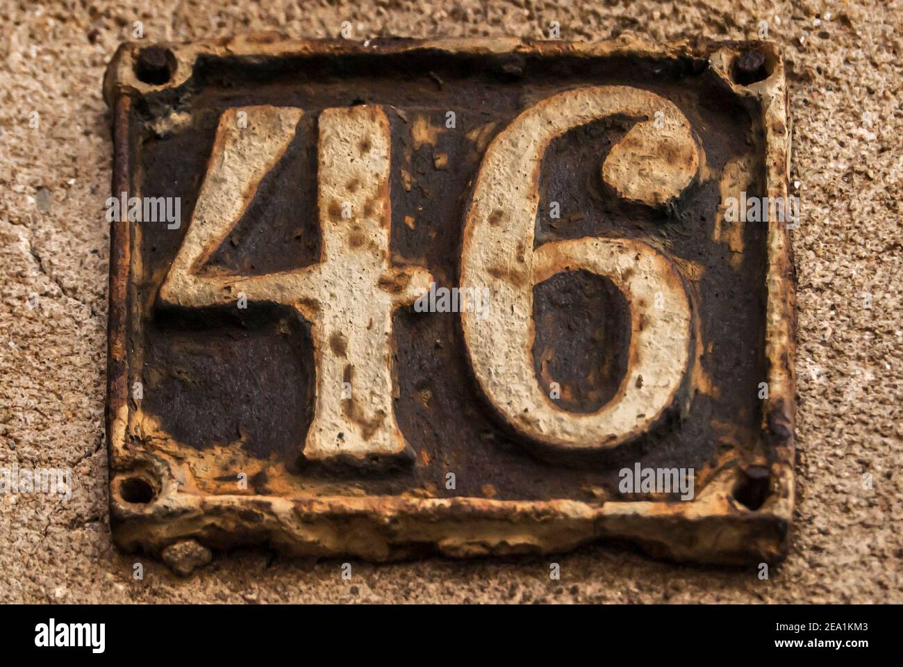 Old retro weathered cast iron plate with number 46 closeup Stock Photo ...