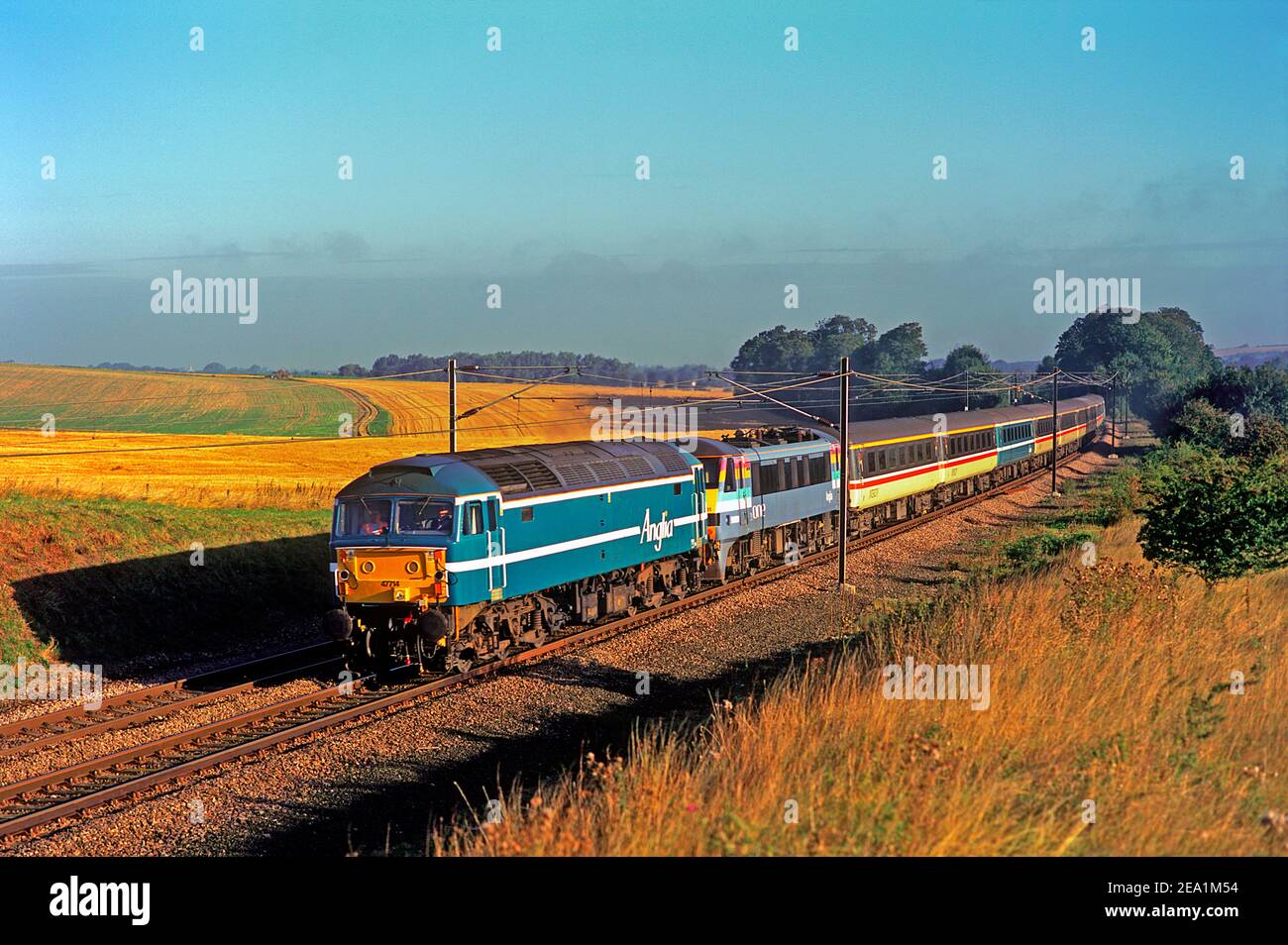 Class 47 diesel locomotive number 47714 with a Class 90 locomotive ...