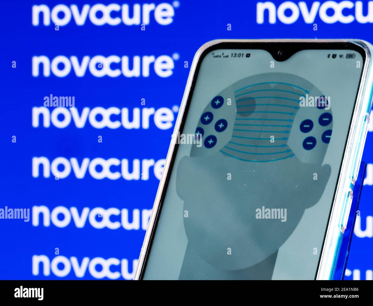 In this photo illustration a NovoCure Ltd logo is seen displayed on a ...