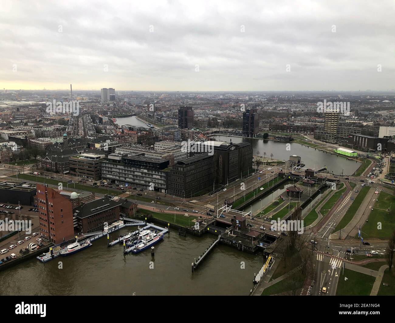 An aerial view of the cityscape with canals and highway roads in ...