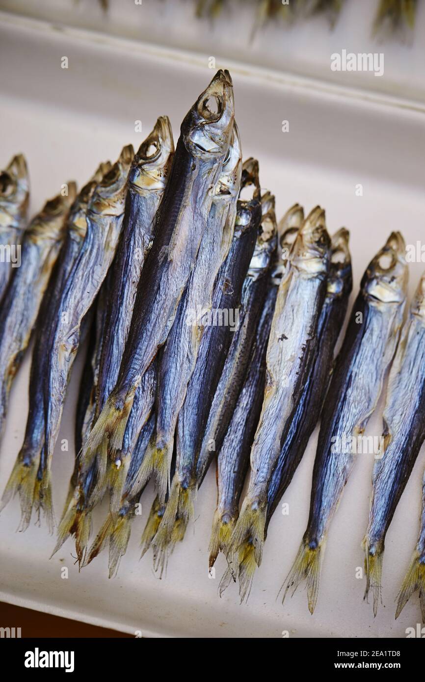 A vertical shot of fresh smelt fish in a market Stock Photo - Alamy