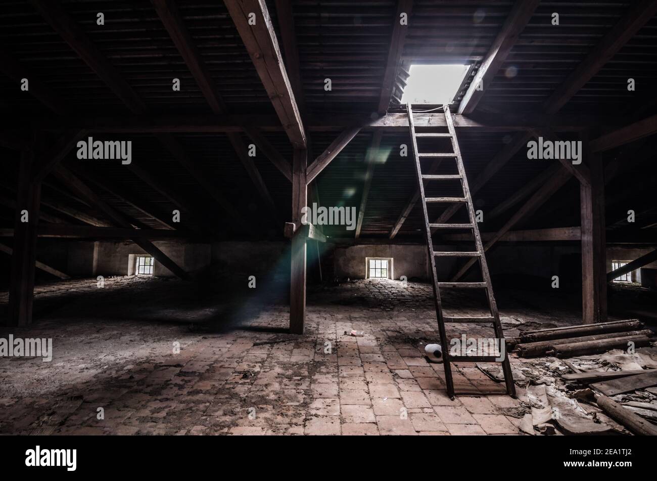 old loft with wooden ladder and light Stock Photo - Alamy