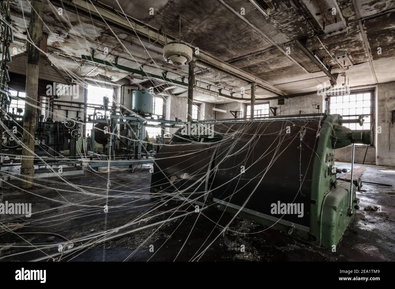 machine with many threads in old spinning mill Stock Photo - Alamy