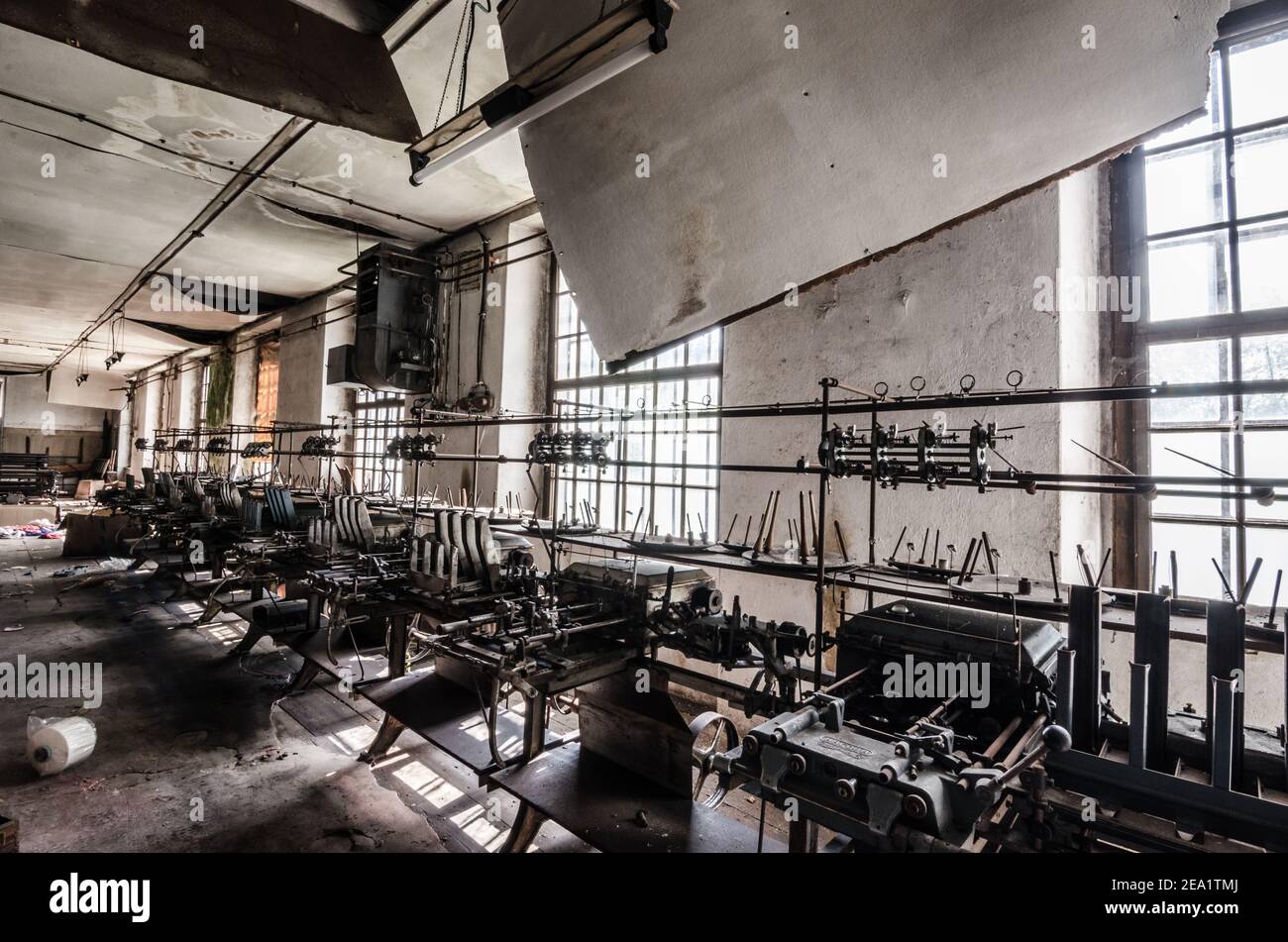 nany machines in hall of spinning factory Stock Photo - Alamy