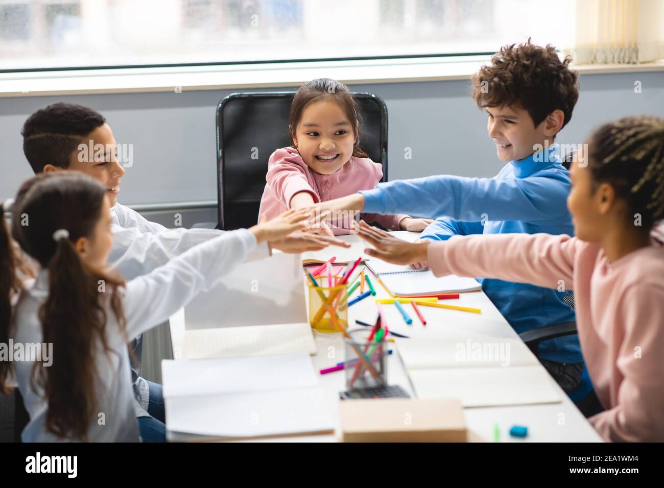 Children playing together diverse hi-res stock photography and images ...